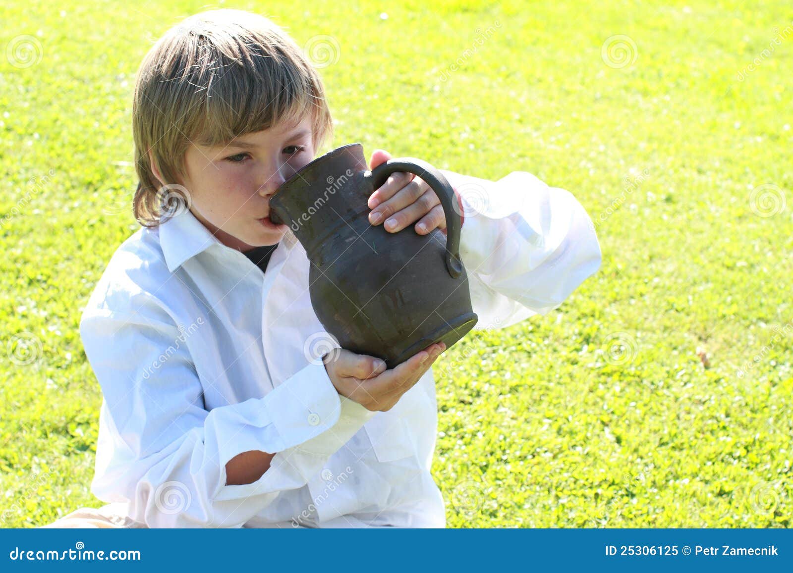 Boy Drinking from a Pitcher Stock Image - Image of european, drinking ...