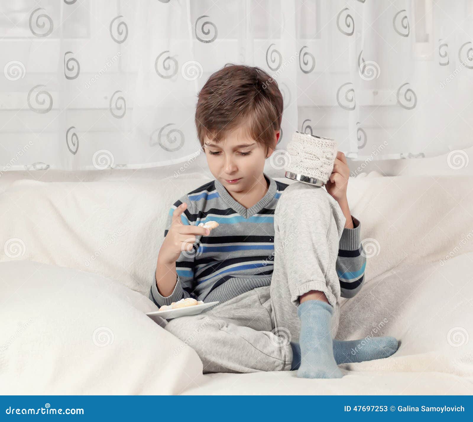 Boy Drinking Tea and Eating Biscuits. Stock Image - Image of drink ...