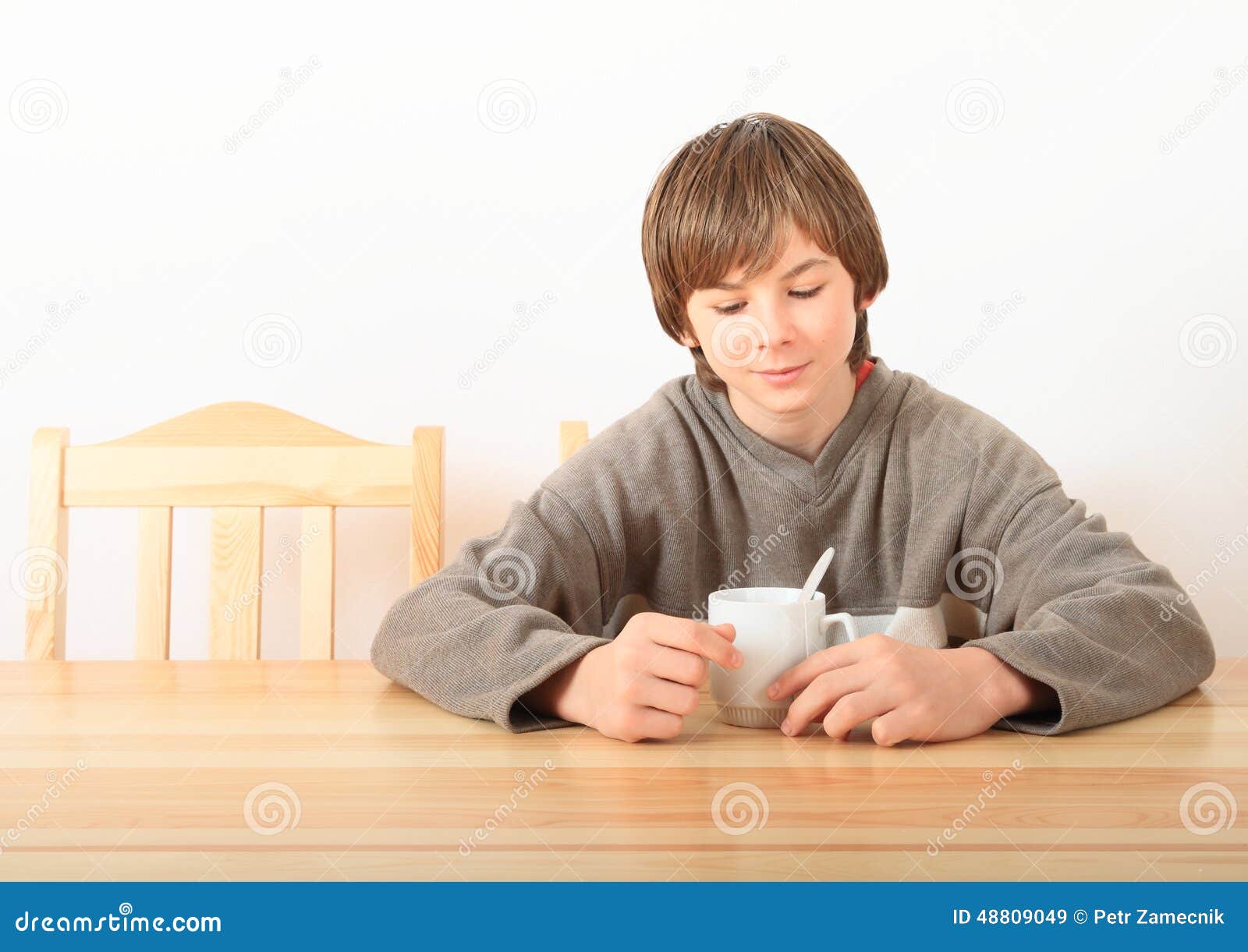 Boy drinking tea stock image. Image of morning, smiling - 48809049 Boy drinking tea stock image. Image of morning, smiling - 48809049
