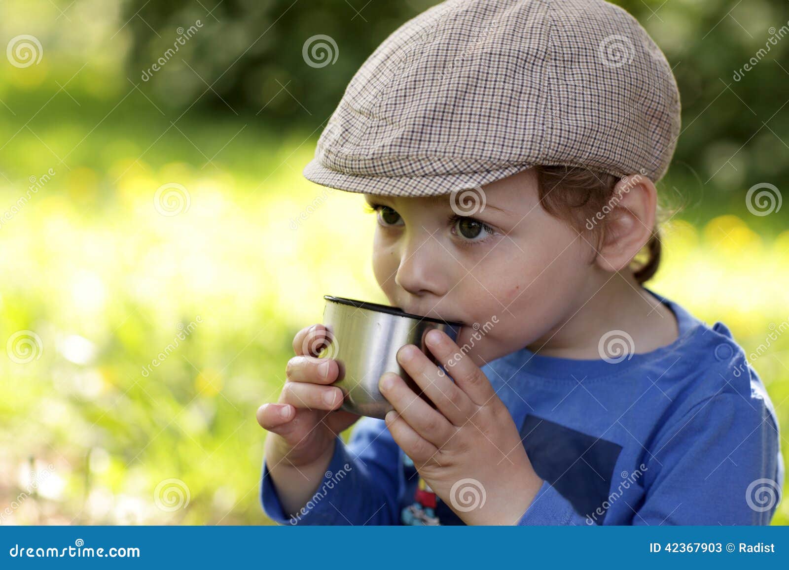 Boy drinking tea outdoor stock image. Image of care, heat - 42367903