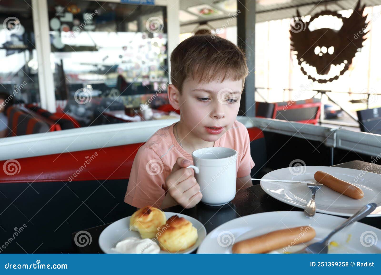 Boy Drinking Tea in Restaurant Stock Photo - Image of morning, concept ...