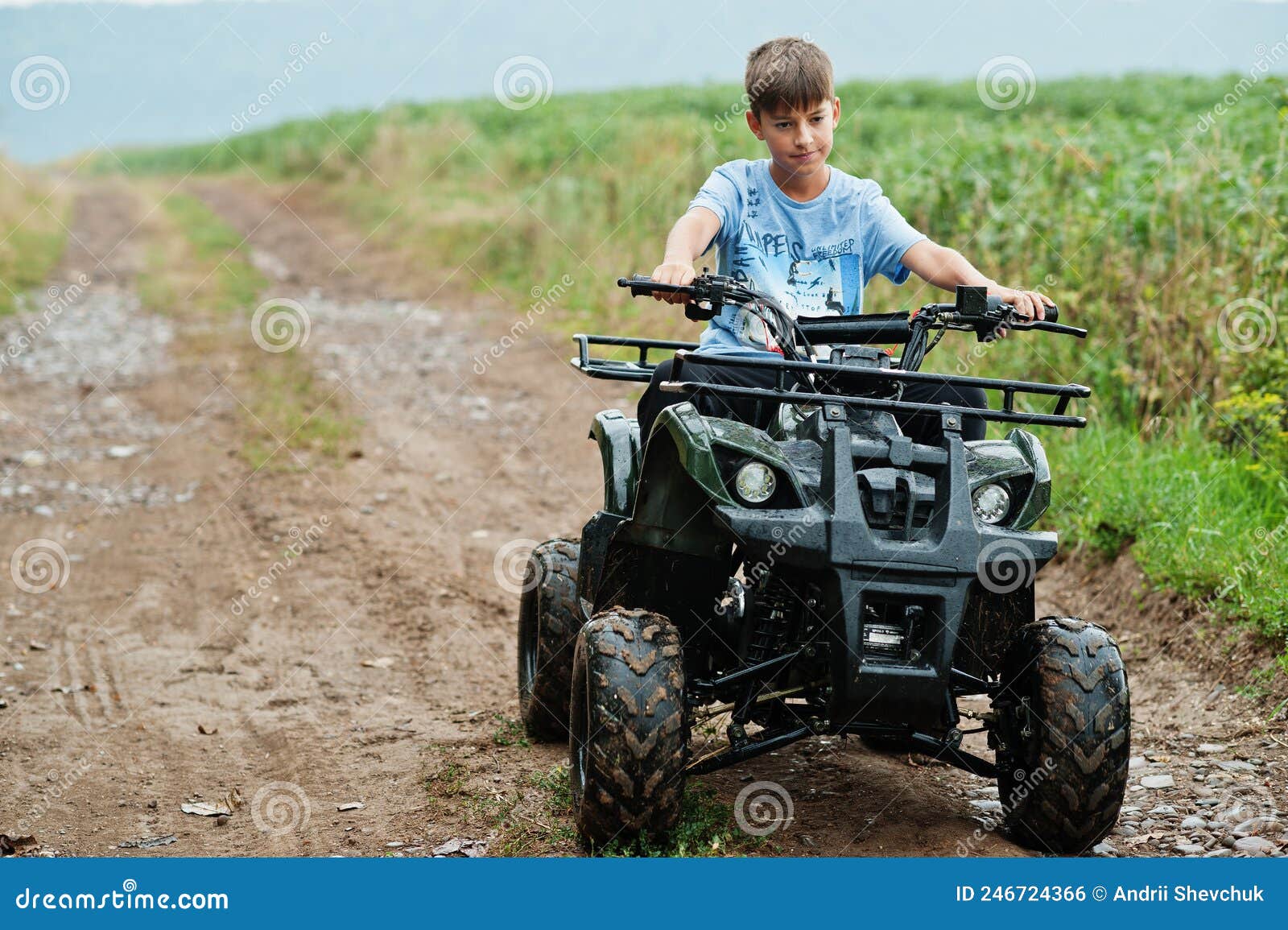 Boy Drive Four-wheller ATV Quad Bike Stock Photo - Image of quad ...