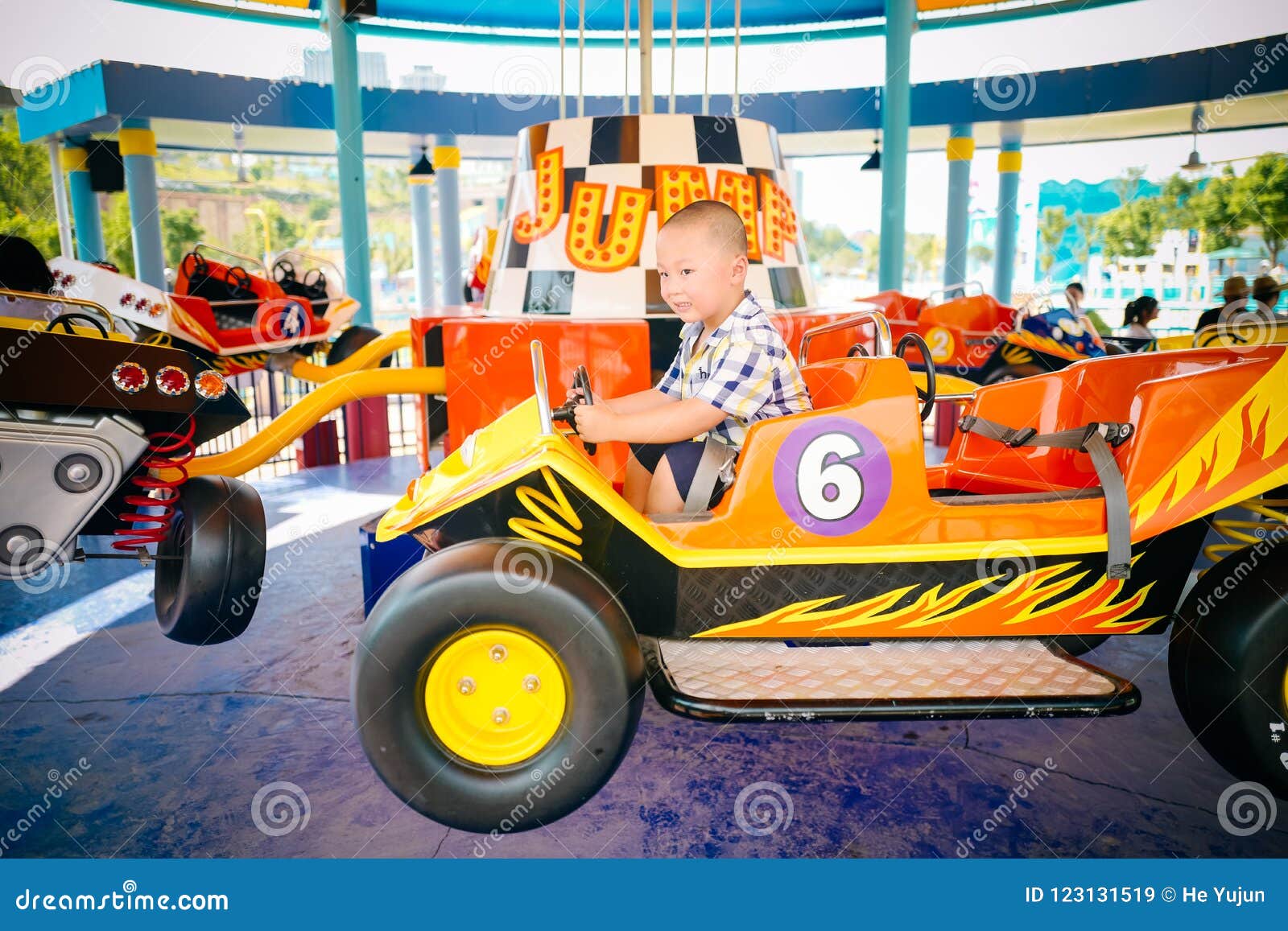 Boy Driving Car in Amusemant Park Stock Image - Image of enjoy, blond ...