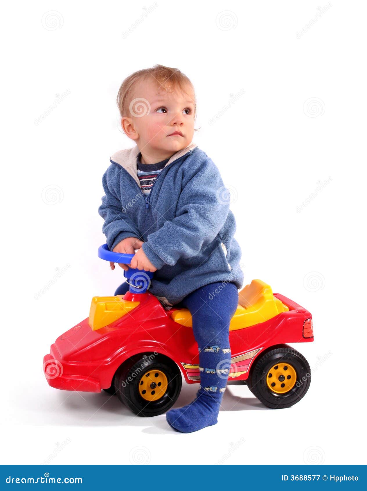 Boy driving a red toy car stock image. Image of male, joker - 3688577
