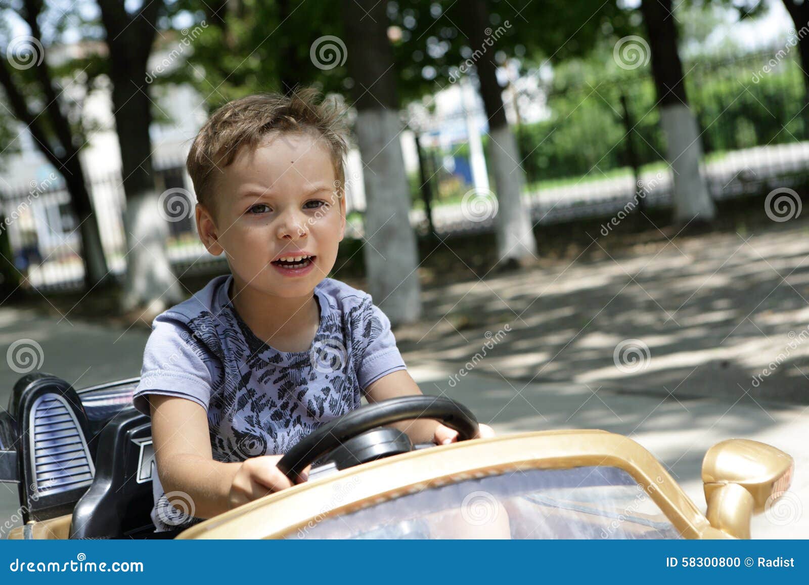 Boy driving a toy car stock photo. Image of drive, driving - 58300800
