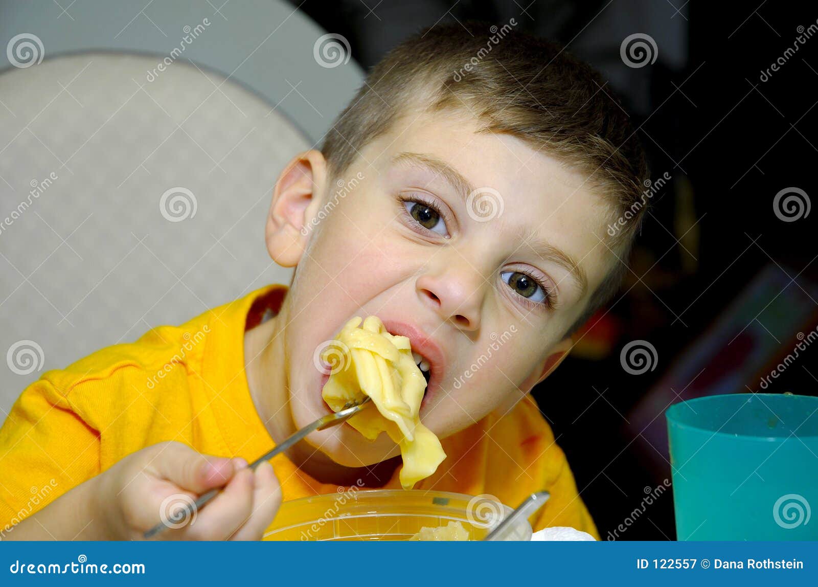 Boy Eating 2 stock image. Image of wonton, table, food - 122557