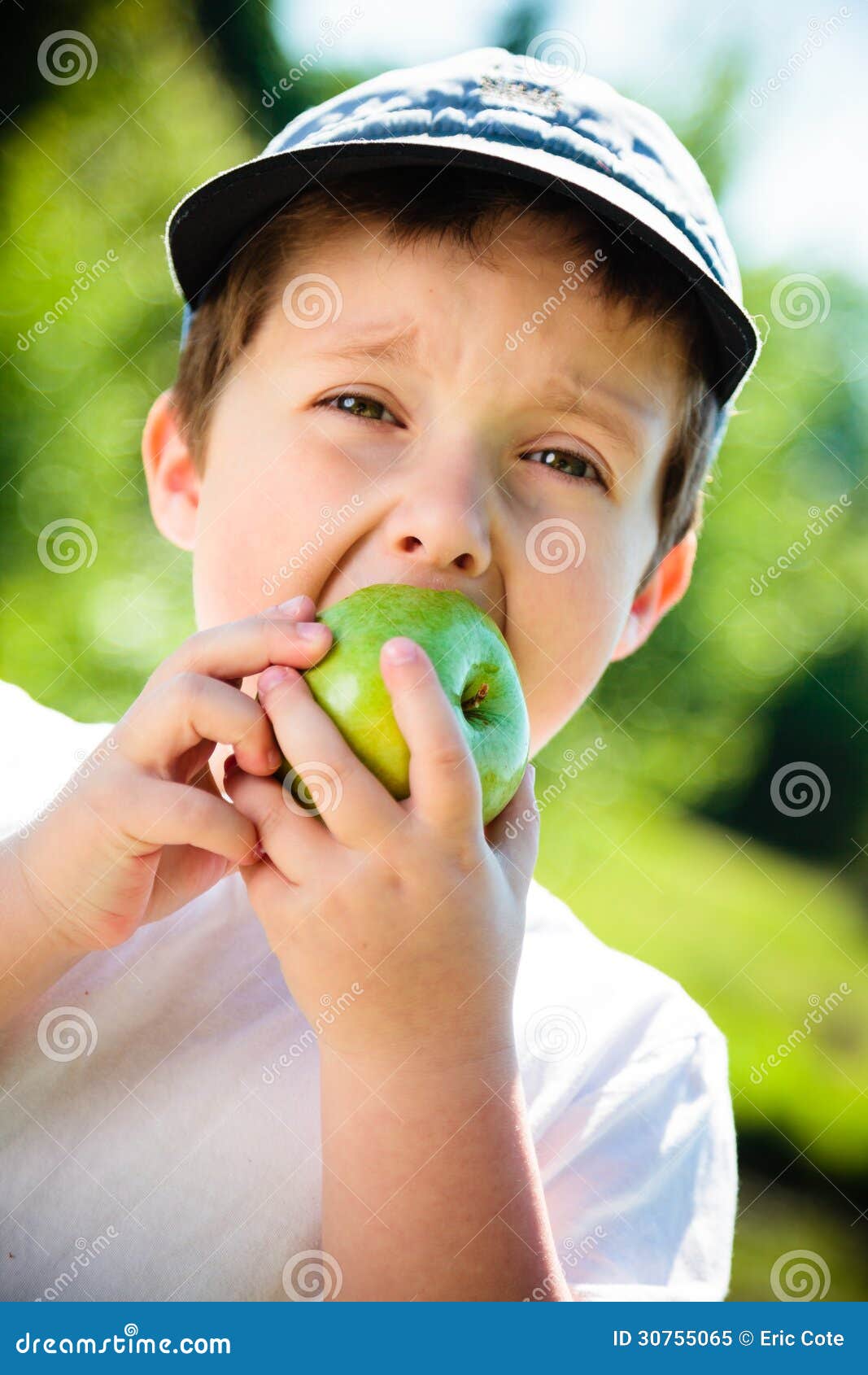 Boy eating an apple stock image. Image of child, young - 30755065