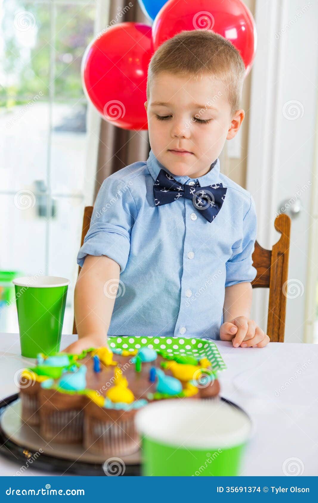 Boy Eating Birthday Cake stock photo. Image of cake, casual - 35691374
