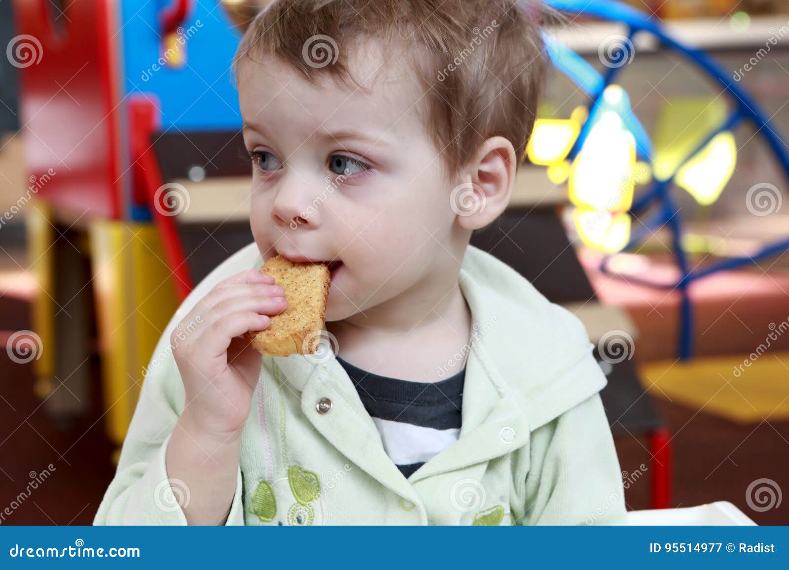 Boy eating biscuit stock image. Image of eating, curiosity - 95514977