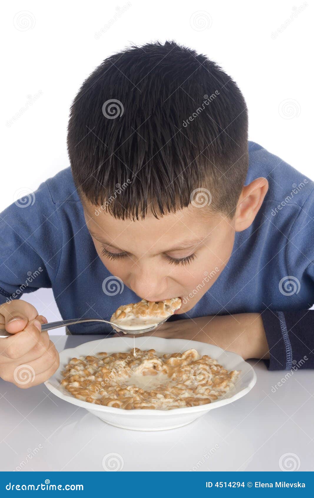 Boy eating breakfast stock photo. Image of infant, spoon - 4514294