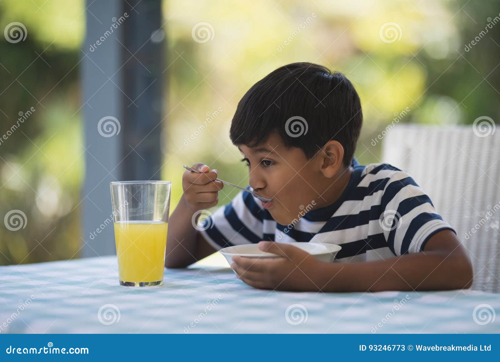 Boy Eating Breakfast at Table Stock Image - Image of ready, freshness ...