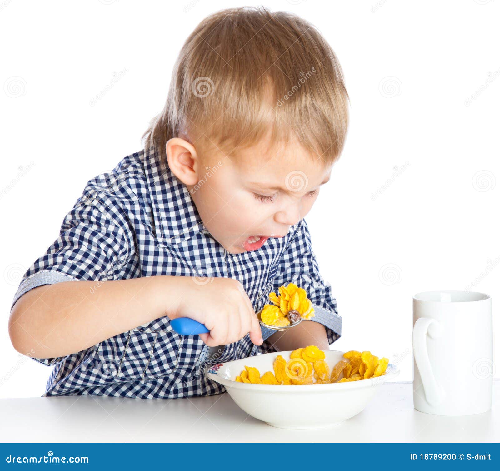 A Boy Is Eating Cereal From A Bowl Stock Photo - Image of isolated ...