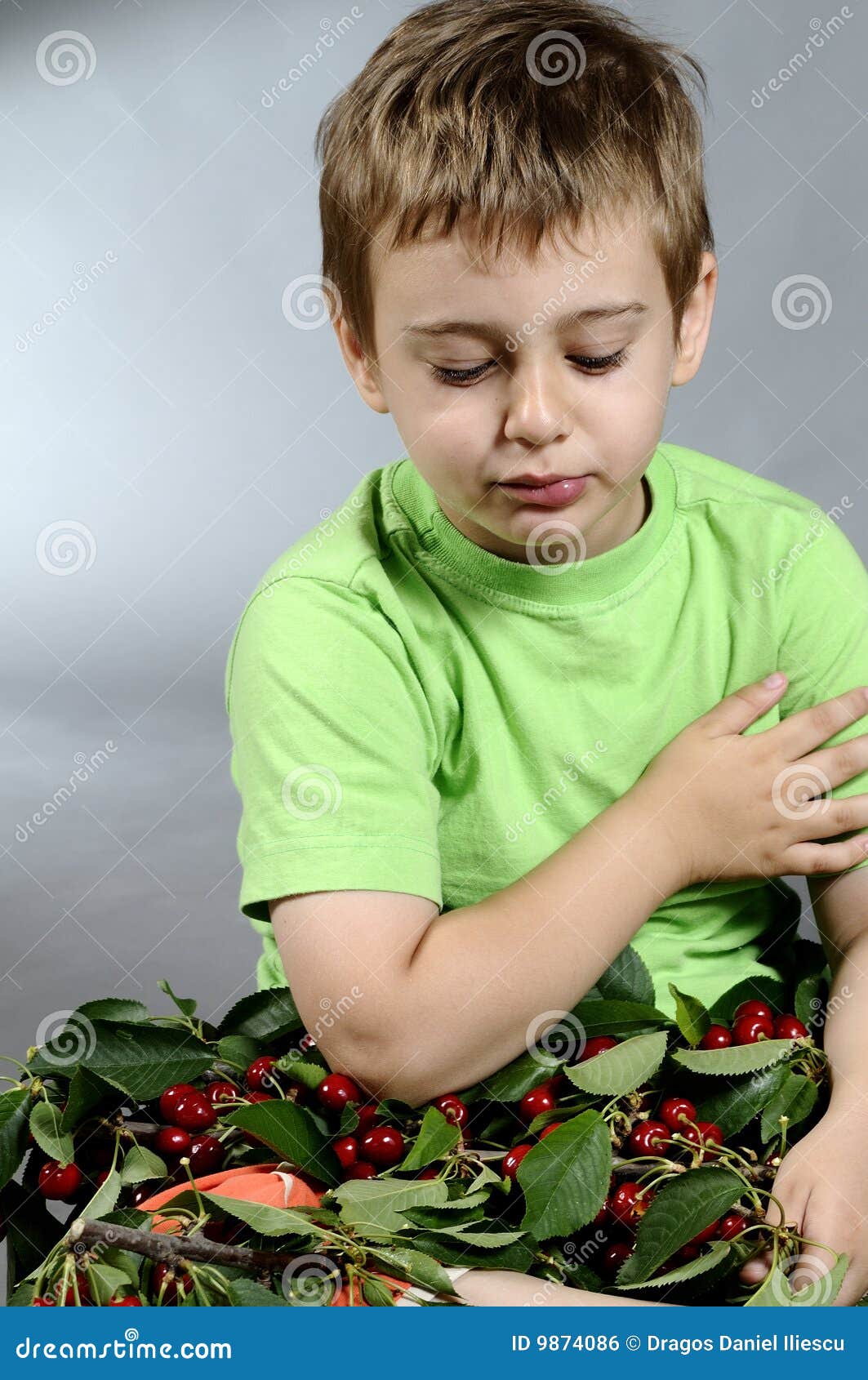 Boy eating cherry stock photo. Image of healthy, circle - 9874086