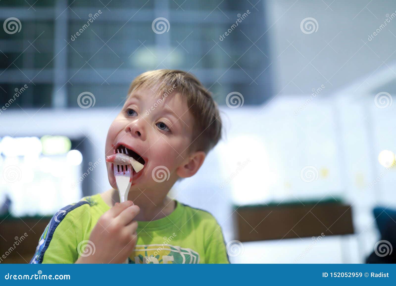 Boy Eating Cherry Dumplings Stock Image - Image of hand, healthy: 152052959