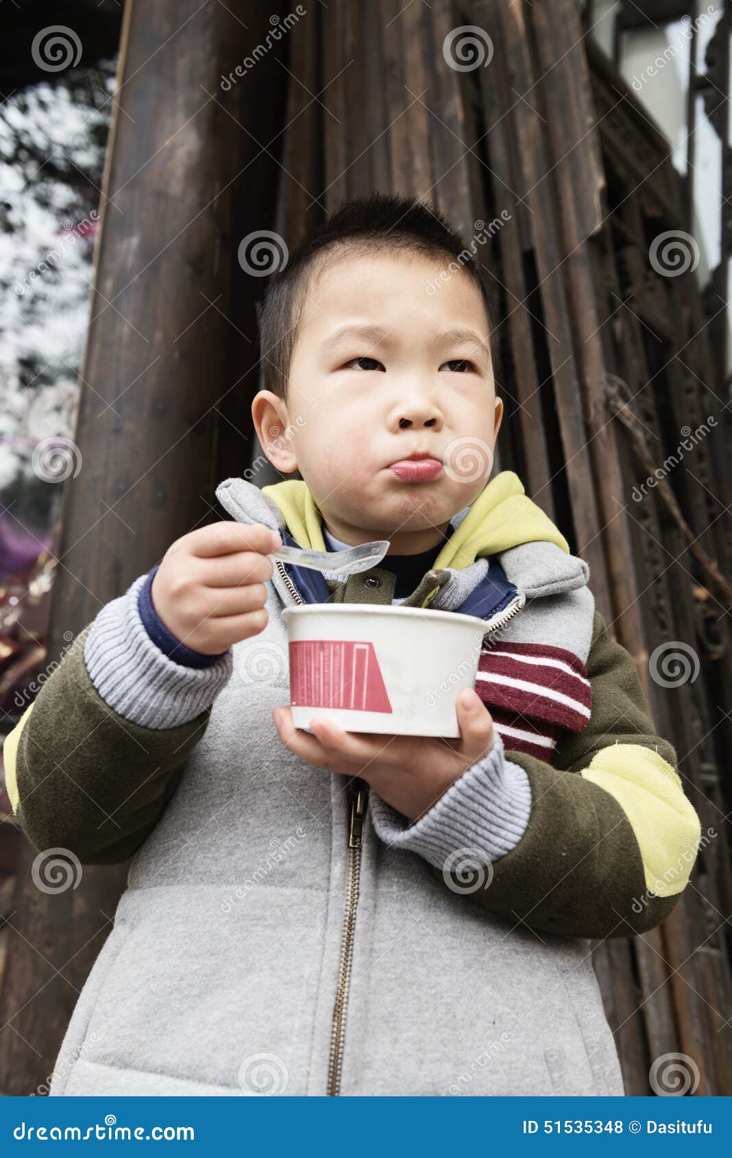 Boy eating congee stock photo. Image of chinese, eating - 51535348