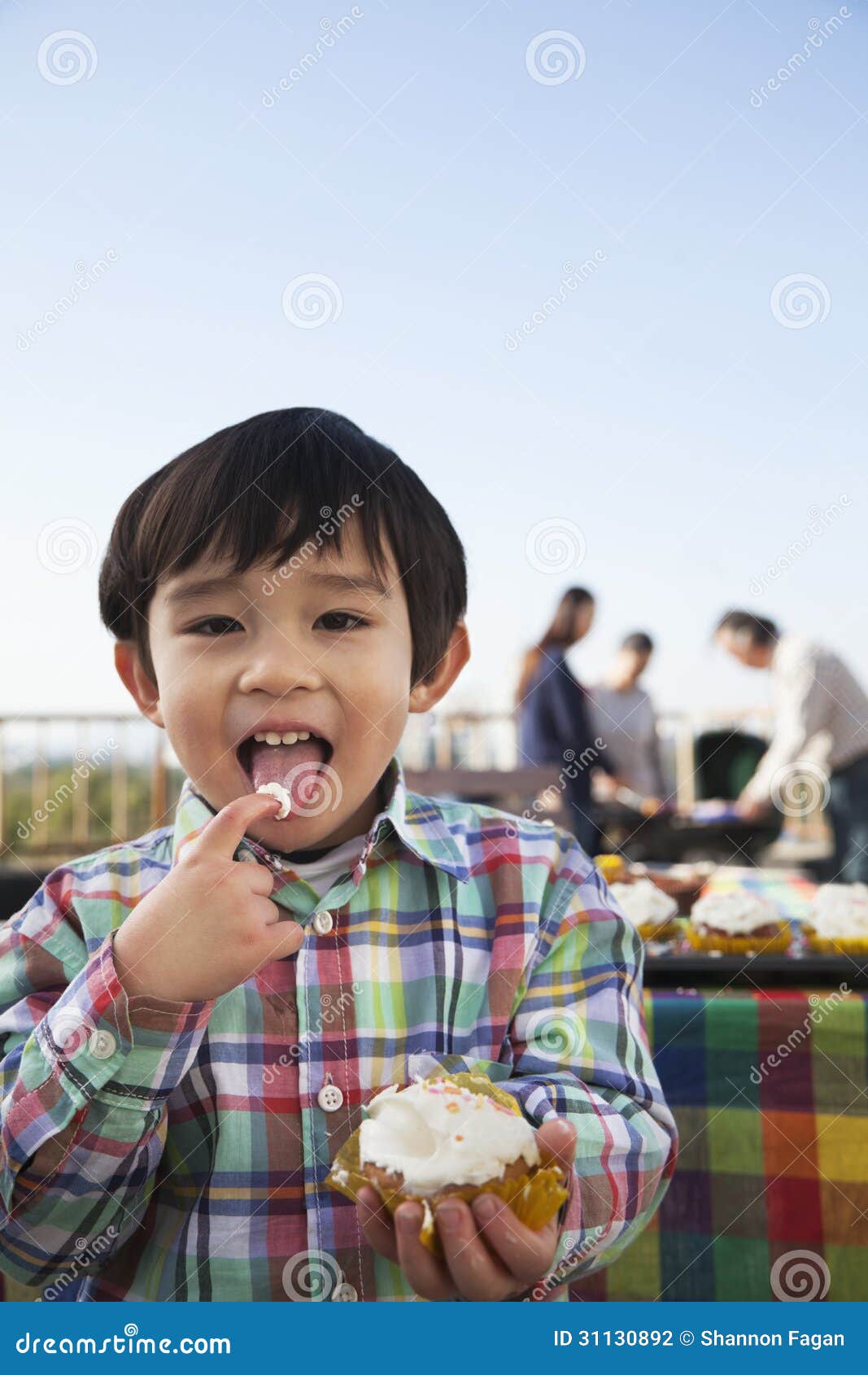 Kid Eating Cupcake