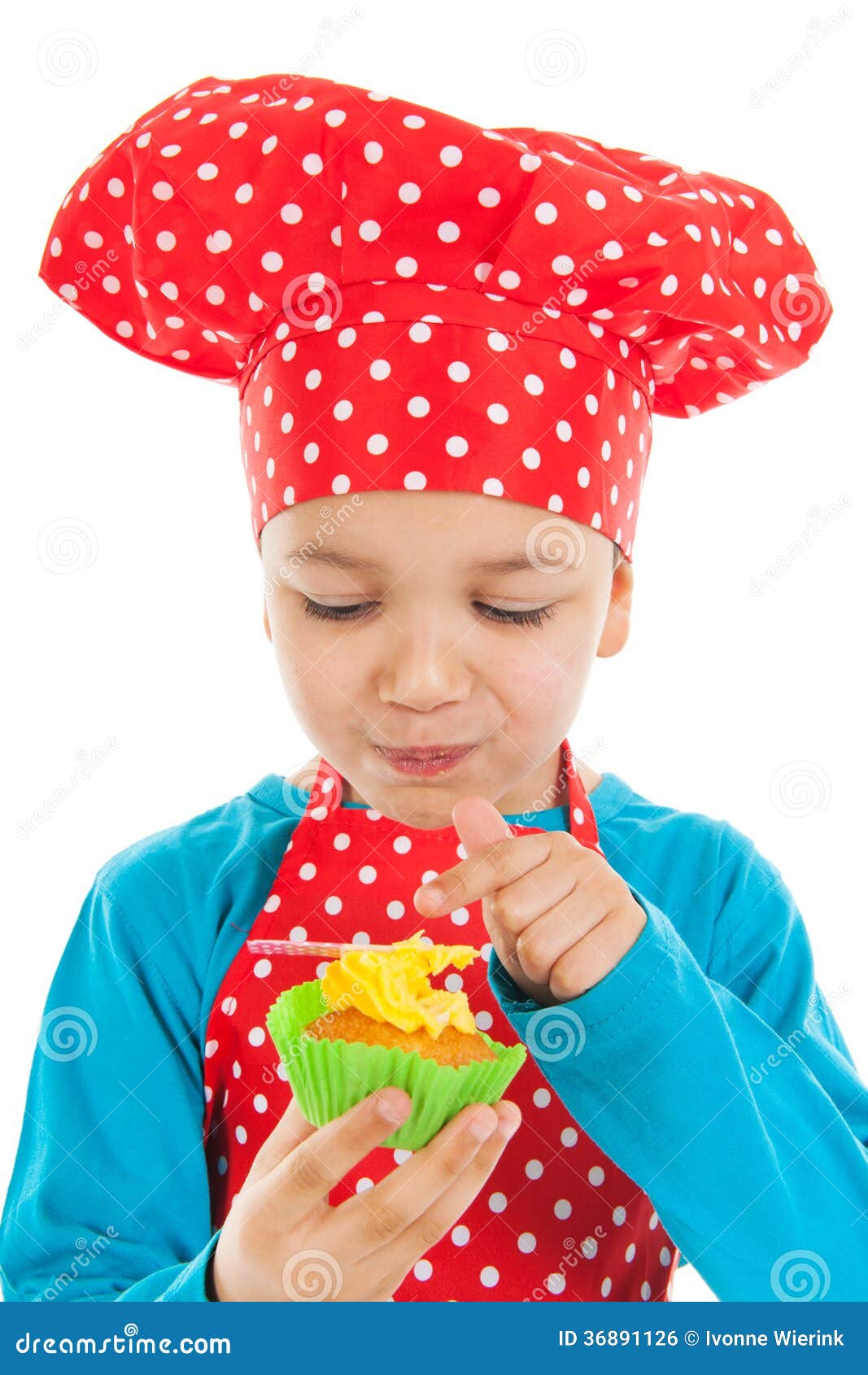Boy is eating cupcake stock photo. Image of checked, blue - 36891126