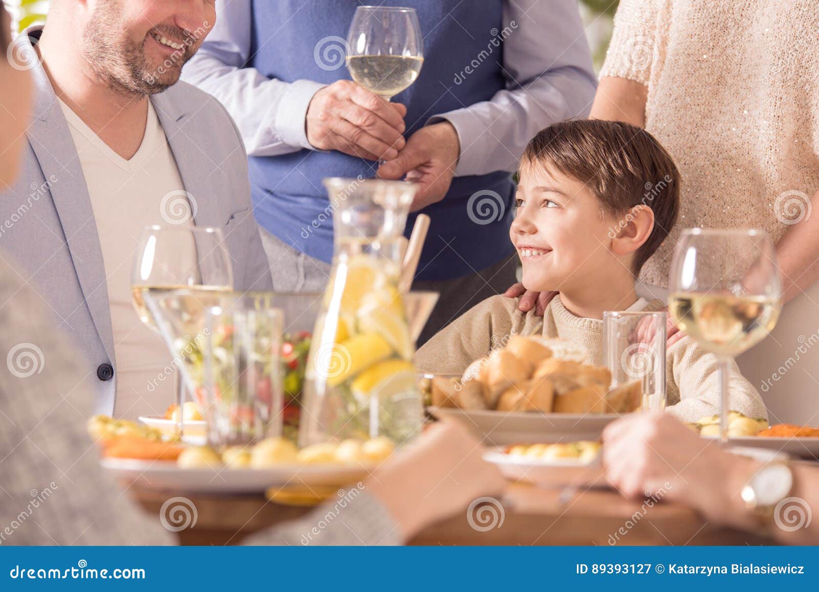 Boy Eating Dinner with Family Stock Image - Image of ceremony, home ...
