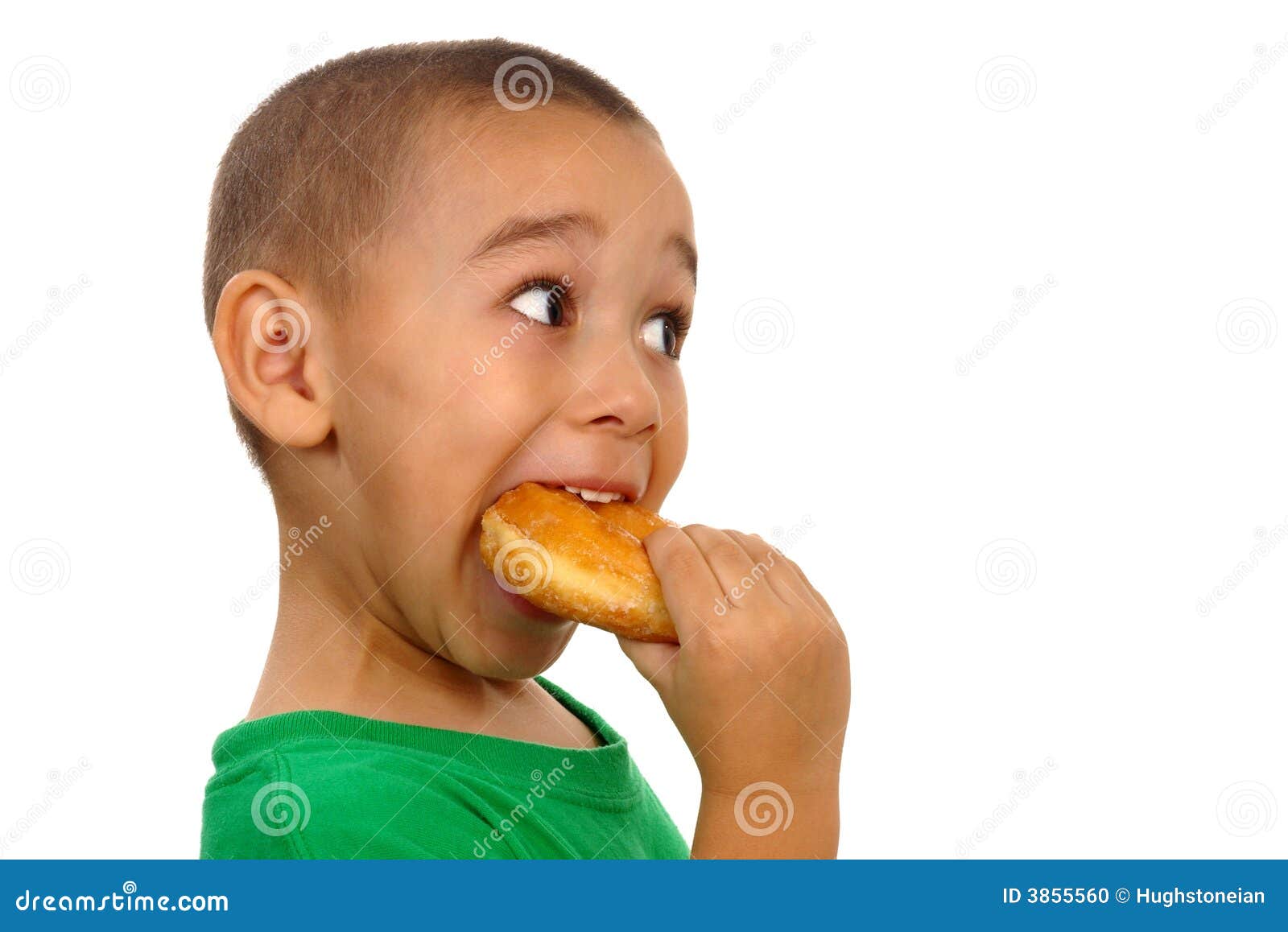 Boy Eating A Donut Stock Photo - Image: 3855560