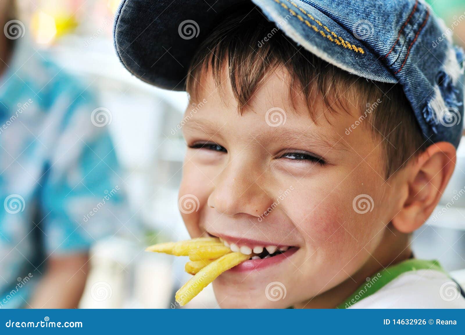 Boy eating french fries stock photo. Image of male, diet - 14632926
