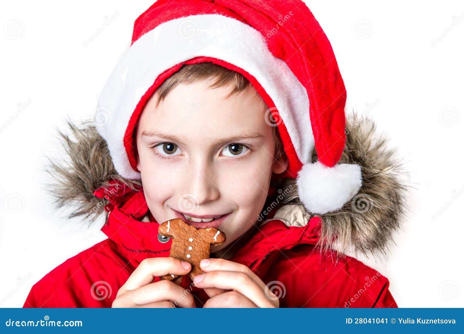 Boy Eating Gingerbread Man. Stock Image - Image of smile, santa: 28041041