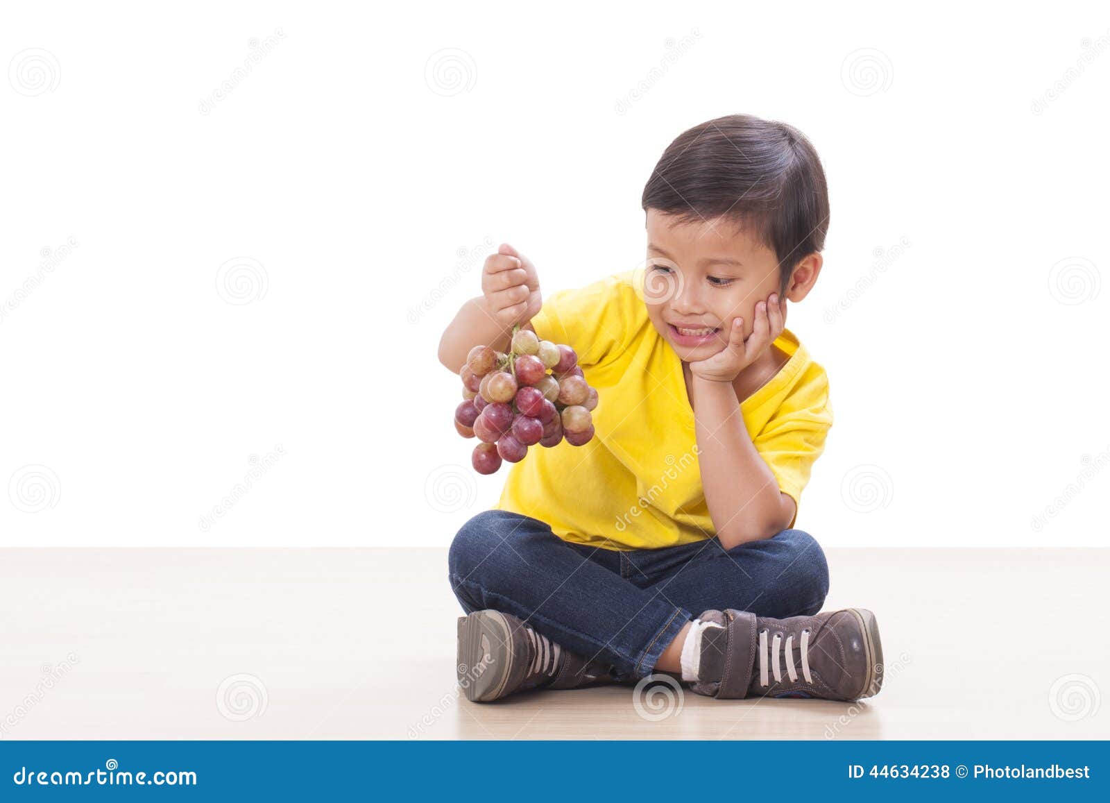 Boy eating grapes stock photo. Image of flavour, eating - 44634238