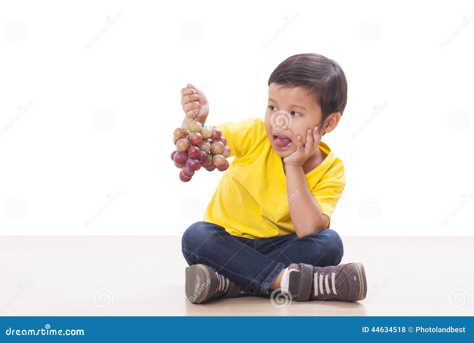 Boy eating grapes stock photo. Image of holding, fresh - 44634518
