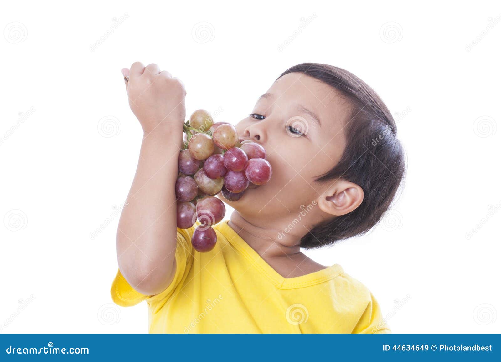 Boy eating grapes stock image. Image of asian, taste - 44634649