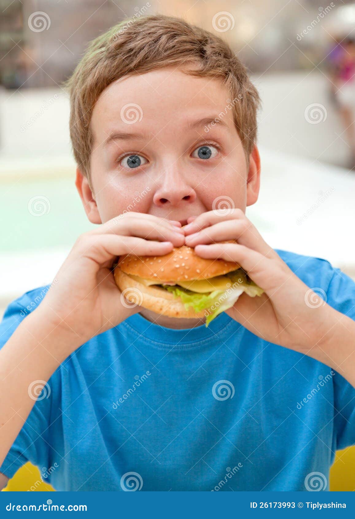 Boy eating hamburger stock image. Image of depression - 26173993
