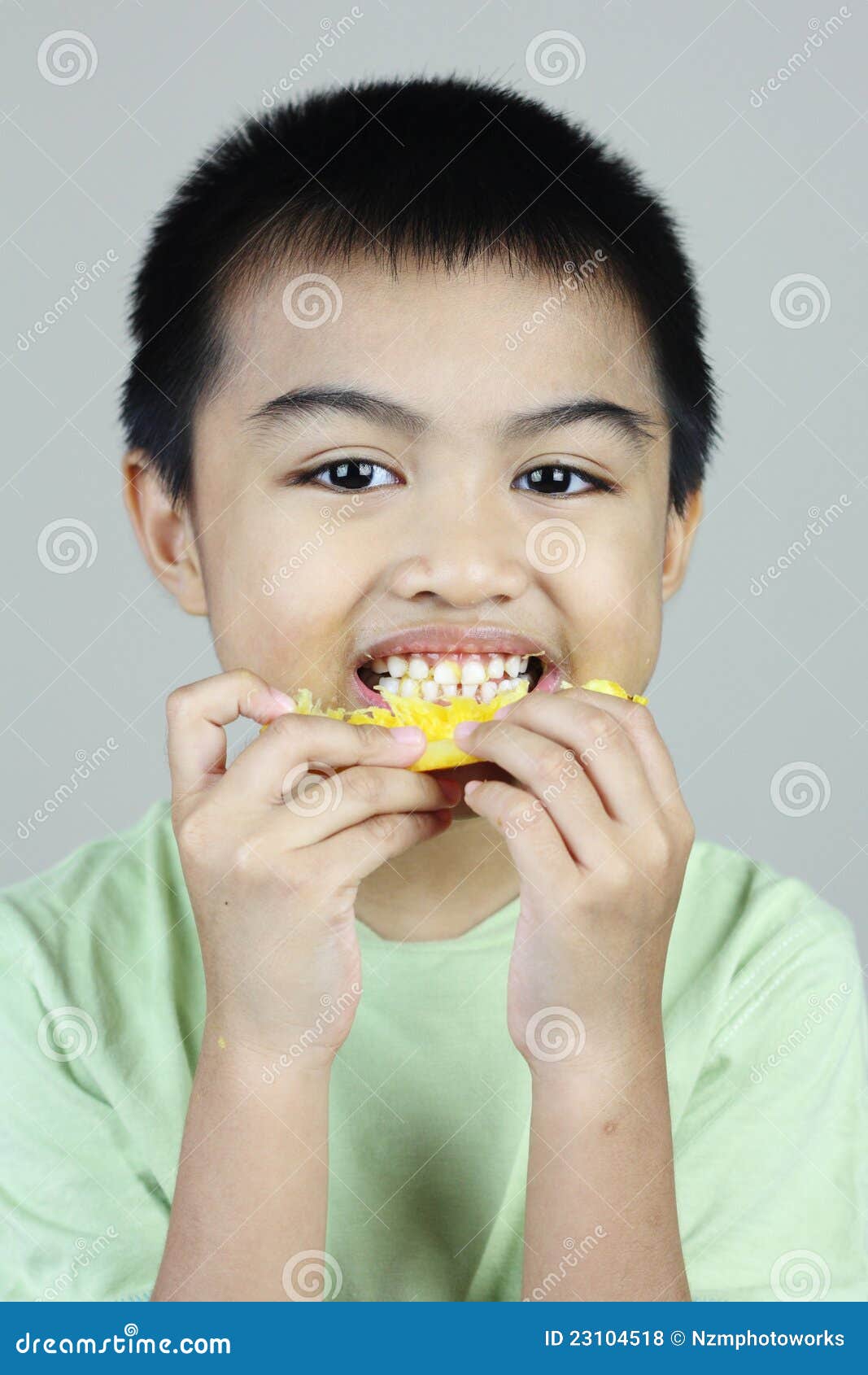 Boy Eating Orange Slice stock photo. Image of laugh, people - 23104518