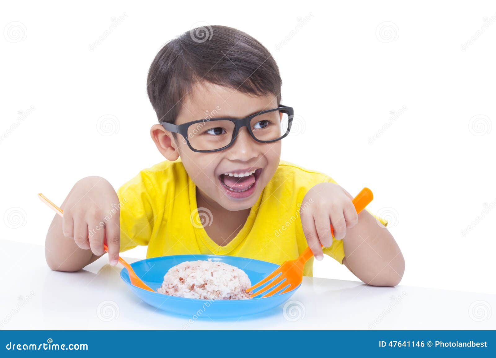 Boy eating rice. stock photo. Image of smile, dislike - 47641146