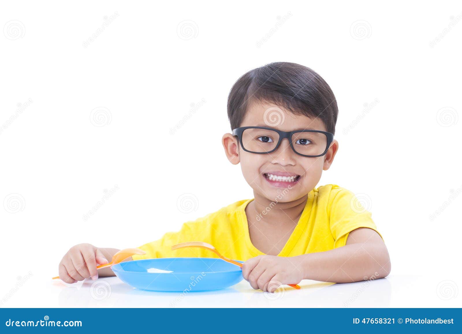 Boy eating rice. stock image. Image of cheerful, breakfast - 47658321