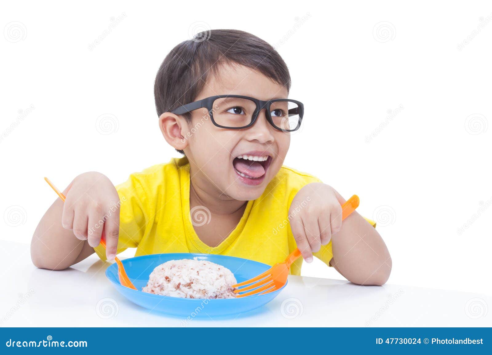 Boy eating rice. stock photo. Image of asia, large, breakfast - 47730024