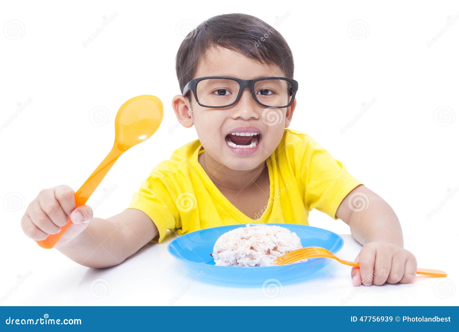 Boy eating rice. stock image. Image of hood, rock, emotions - 47756939