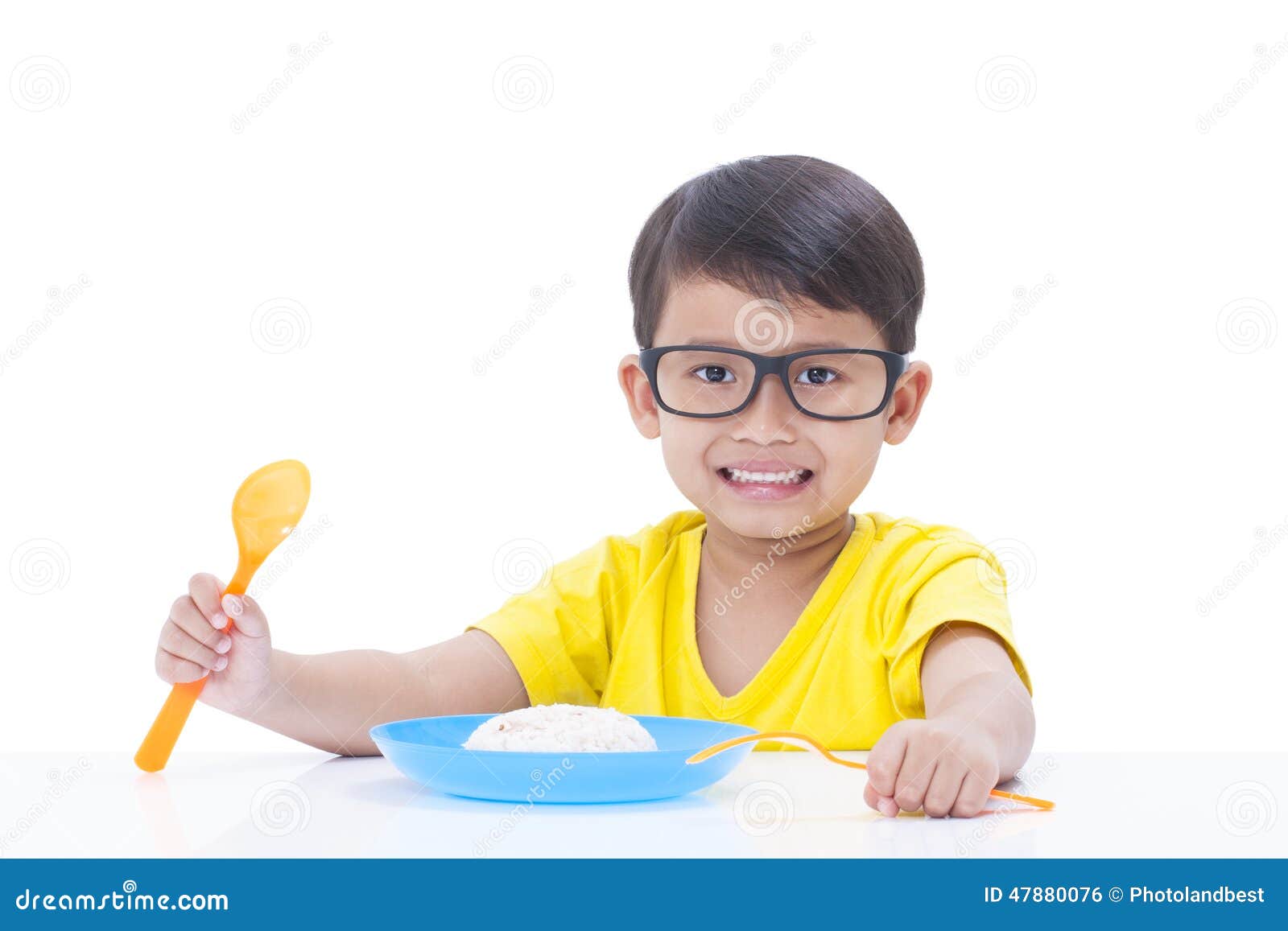 Boy eating rice. stock photo. Image of delicious, spoon - 47880076