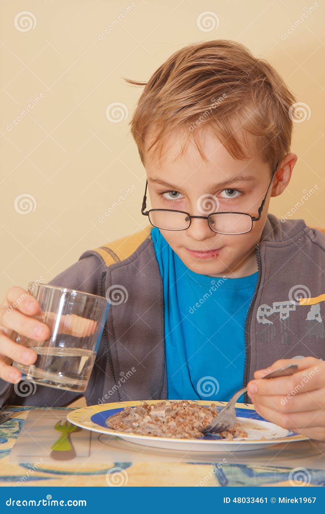 Boy is eating stock image. Image of dining, water, child - 48033461