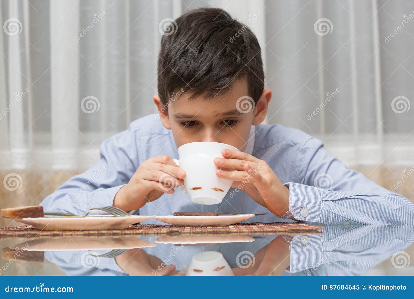 Boy Eating Soup at the Kitchen Table Stock Image - Image of design ...