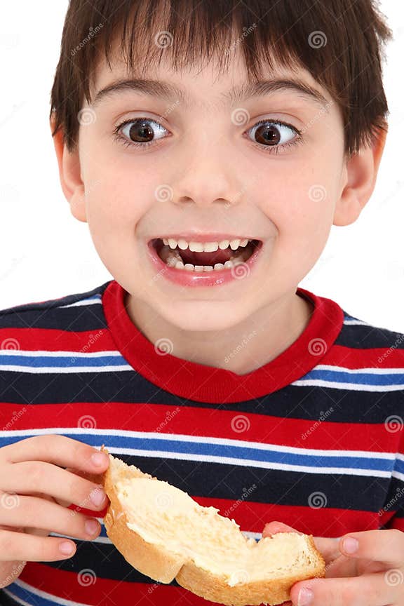 Boy Eating Toast stock image. Image of butter, meal, lunch - 8669405