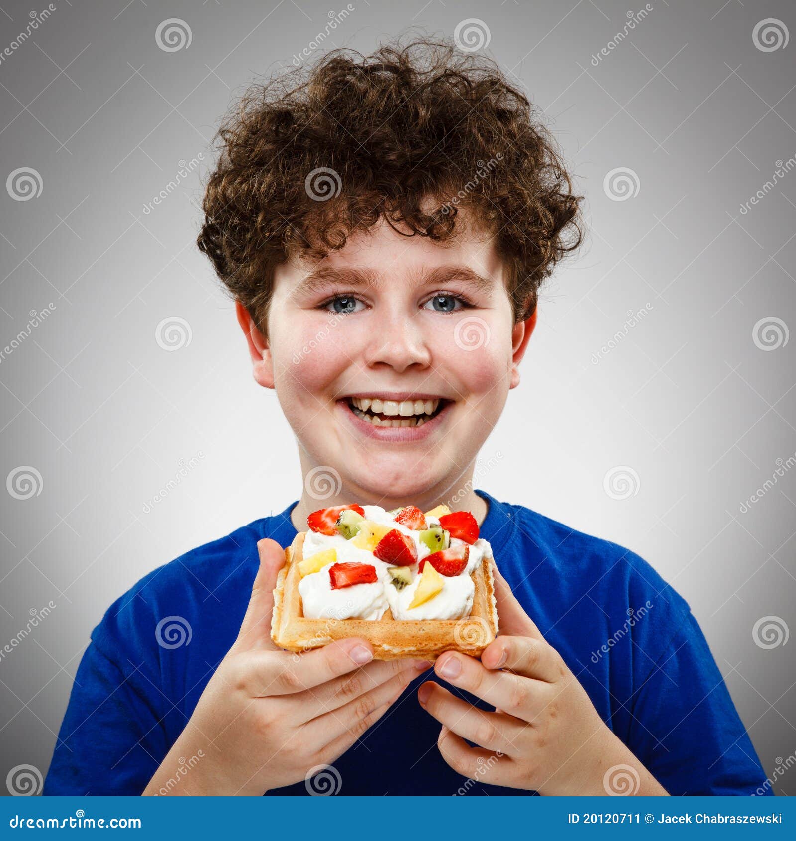 Boy eating waffle stock image. Image of peaches, holding - 20120711
