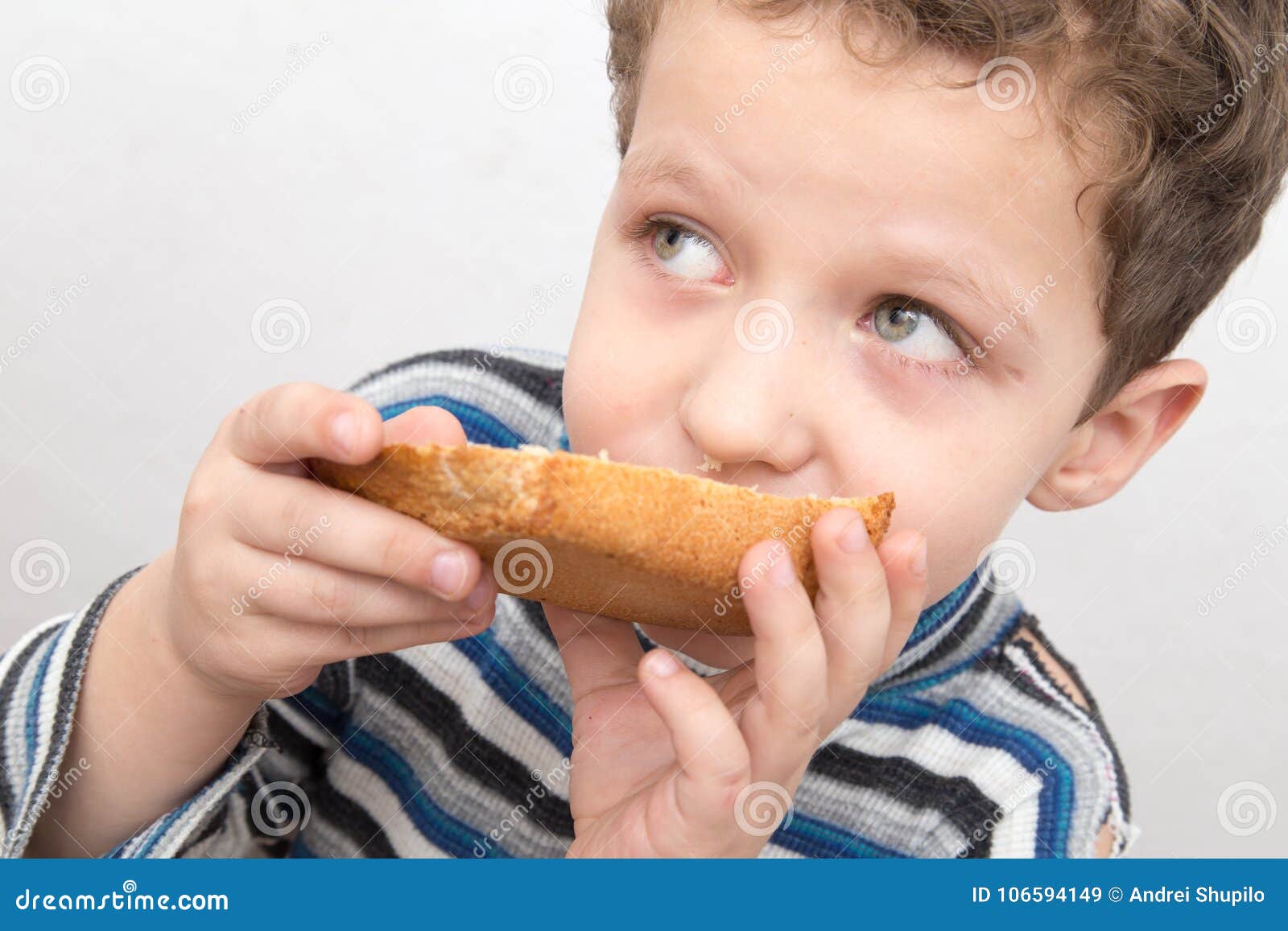 Boy eats bread stock image. Image of sandwich, face - 106594149