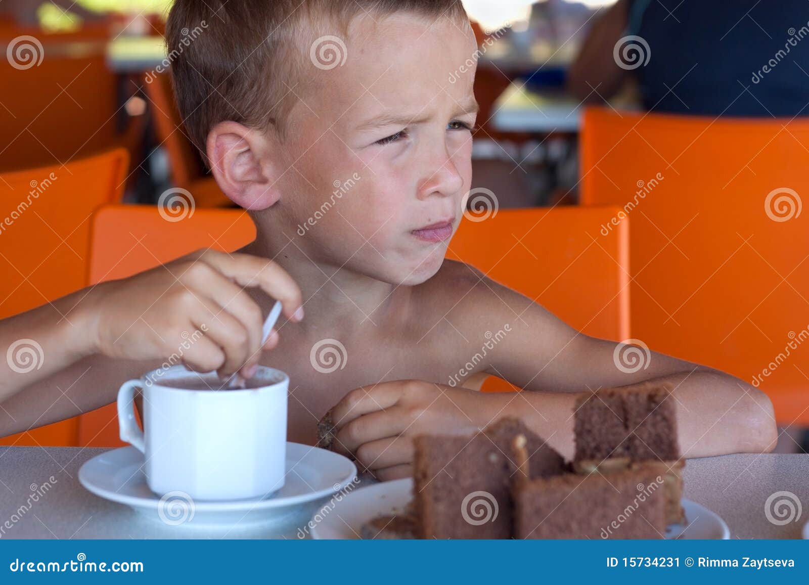 Boy eats in a cafe. stock image. Image of desk, horizontal - 15734231