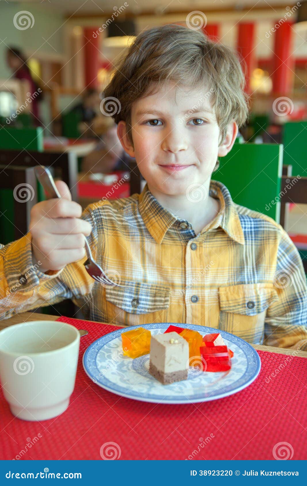 Boy eats dessert stock photo. Image of indoor, smiling - 38923220