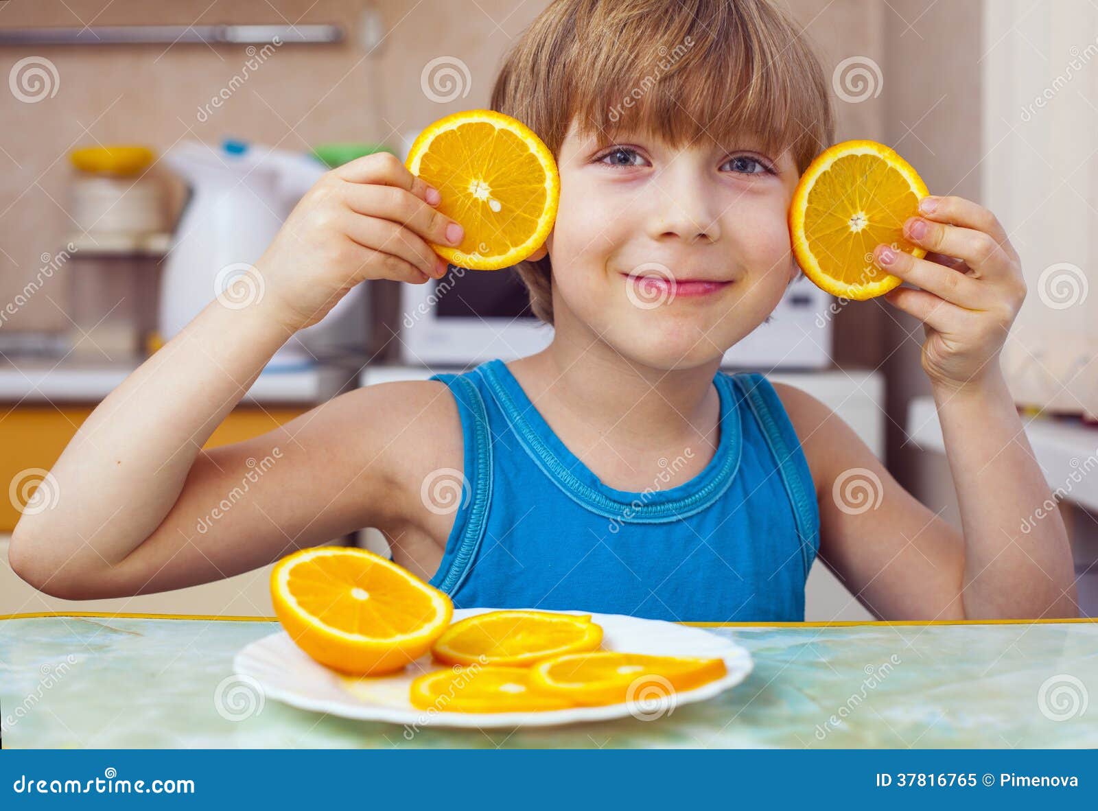 Boy eats orange stock image. Image of green, nutrition - 37816765
