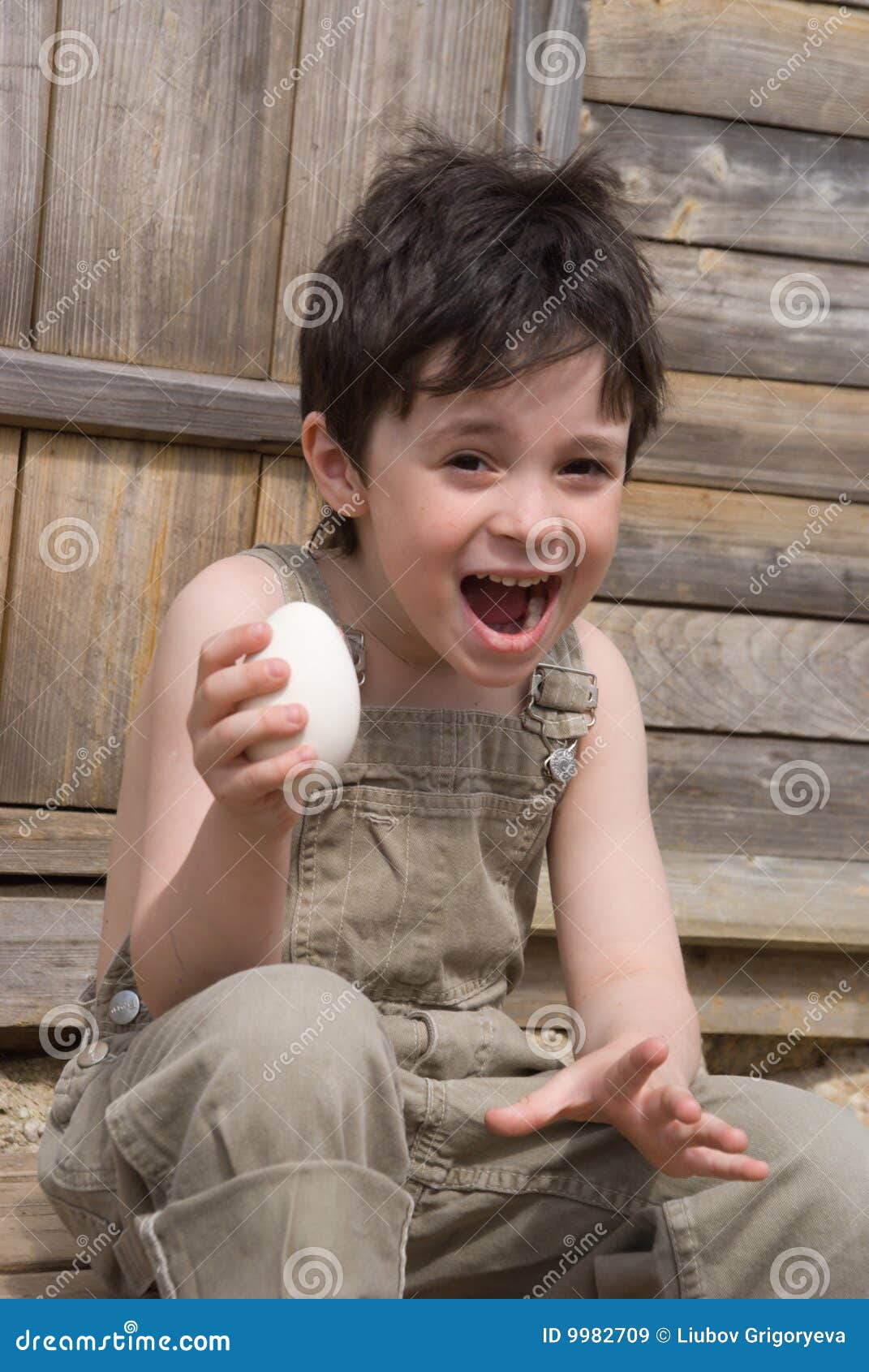 The boy with egg stock image. Image of curiosity, ingredient - 9982709