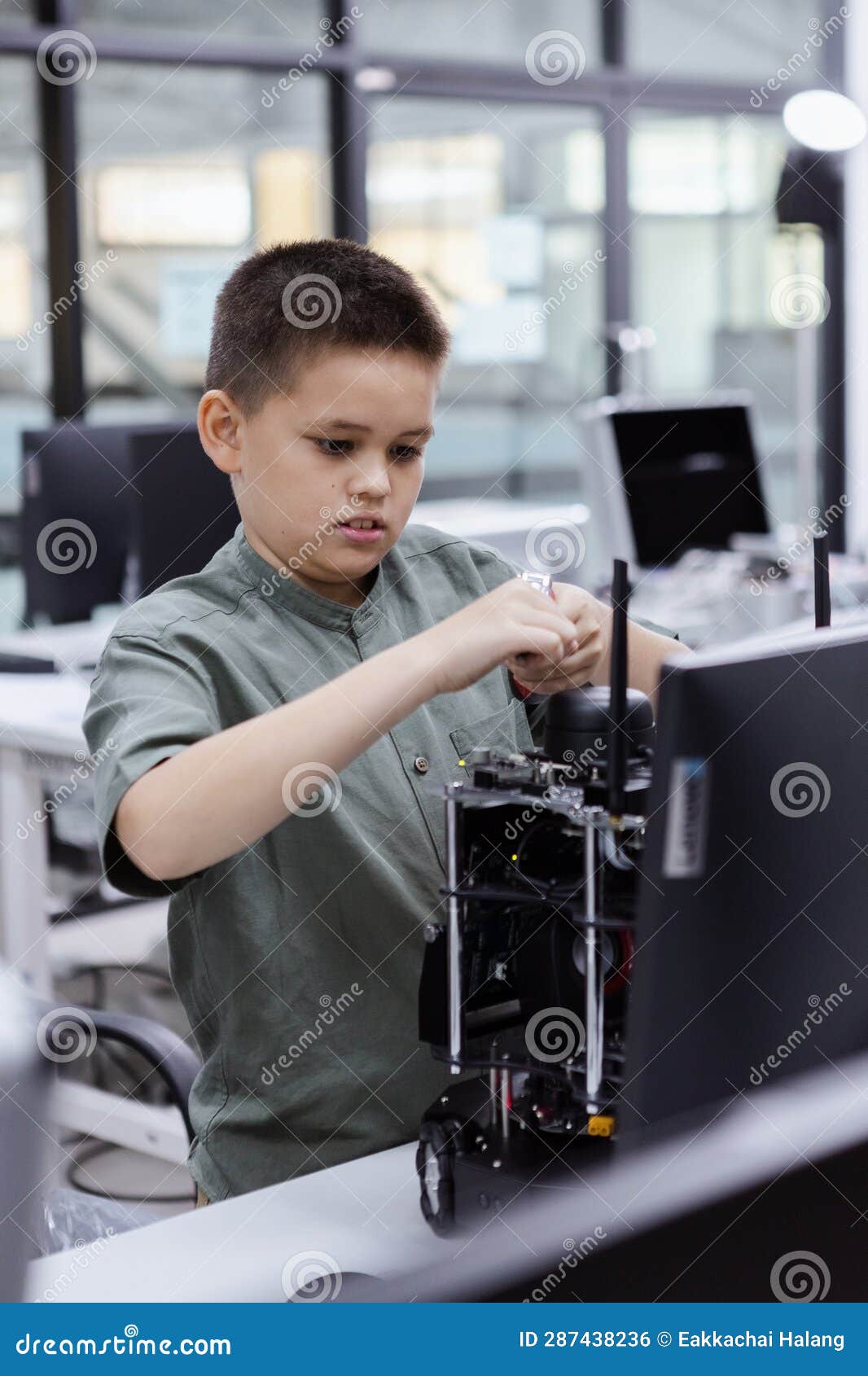 Boy in Electronic Class Room. Kid Boy Education Electronic AI Class and ...