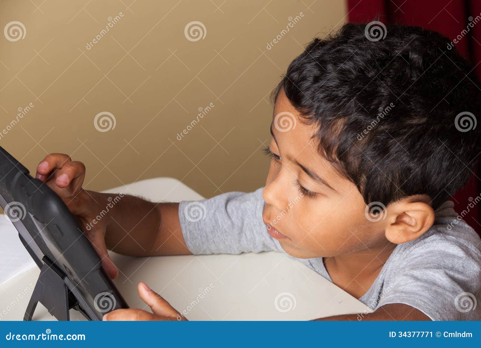 Hispanic Boy with Electronic Tablet Stock Image - Image of home, school ...