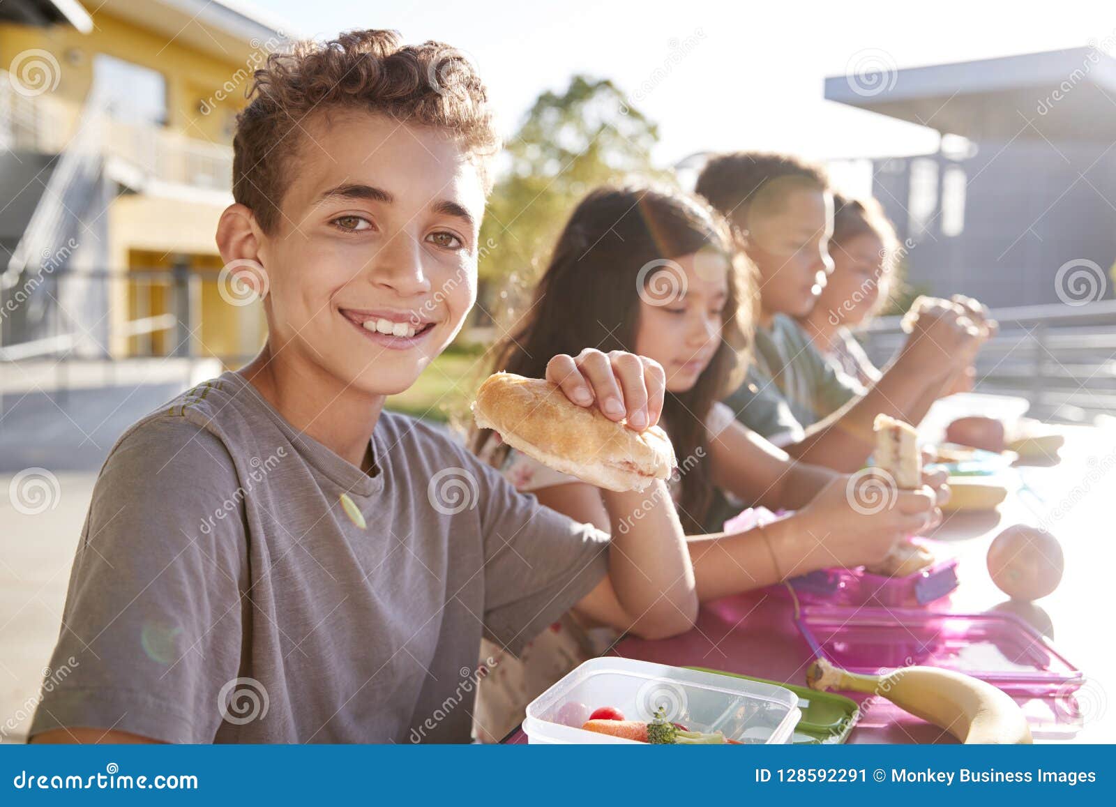 Boy at Elementary School Lunch Table Smiling To Camera Stock Image ...