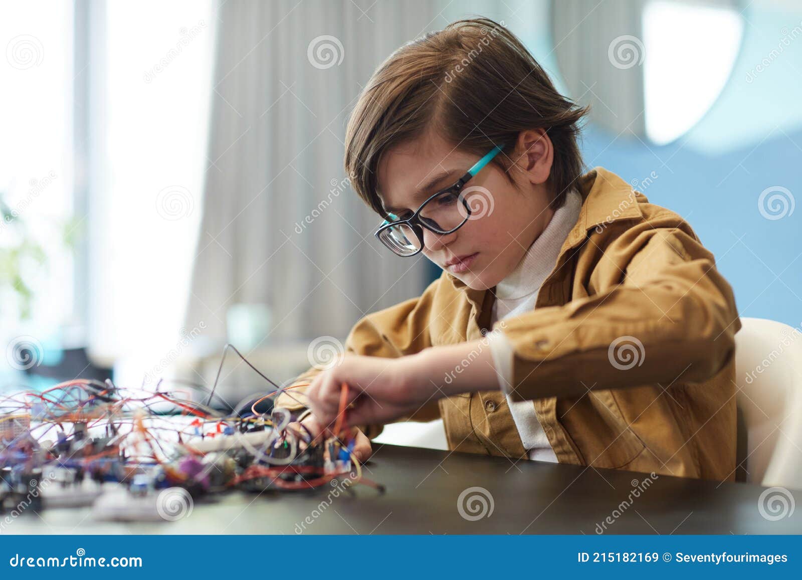 Boy in Engineering Class stock image. Image of happiness - 215182169