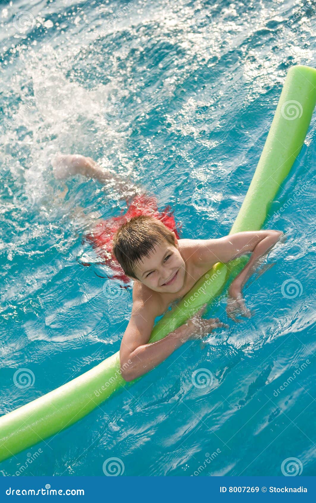 Boy enjoy in the pool stock image. Image of sunny, expression - 8007269