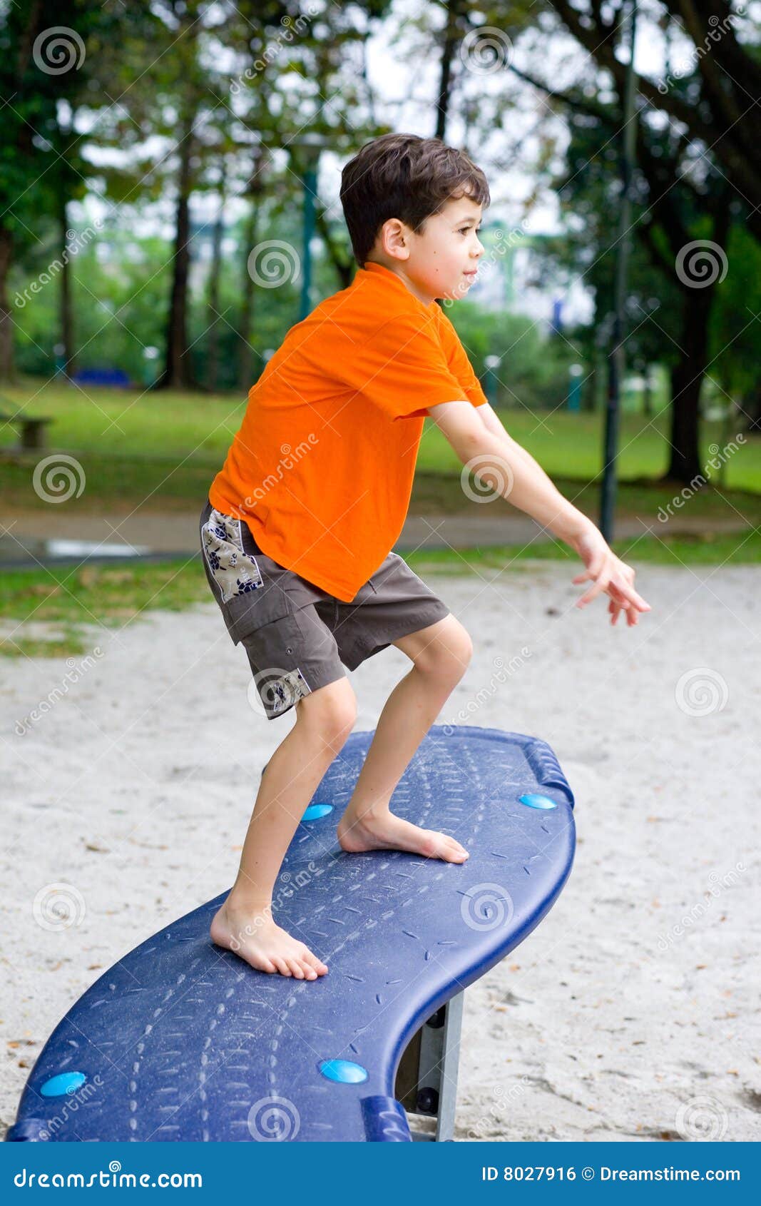 Boy Enjoying Balancing Beam Stock Photo - Image of play, childhood: 8027916